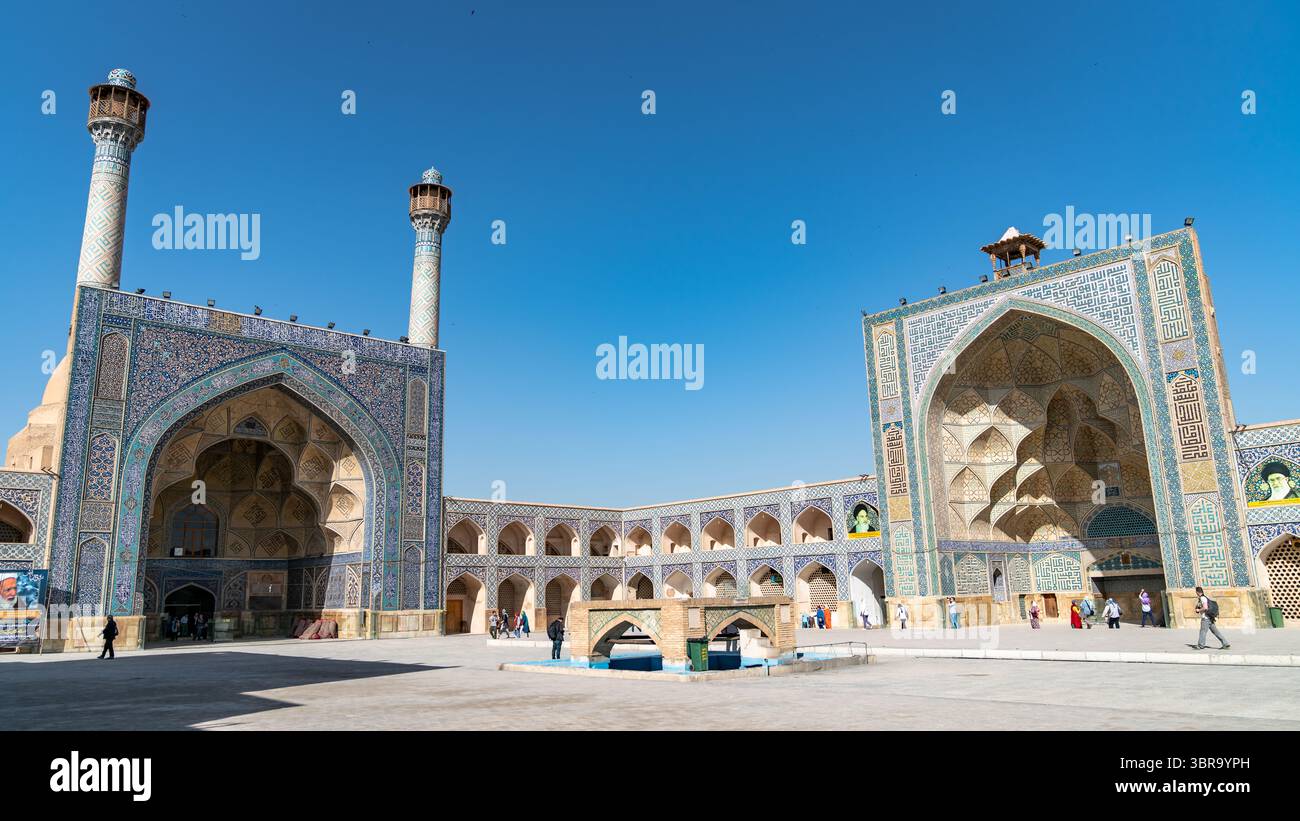 Isfahan, Iran - 14 May 2019: Visitors explore the historic Jameh Mosque ...