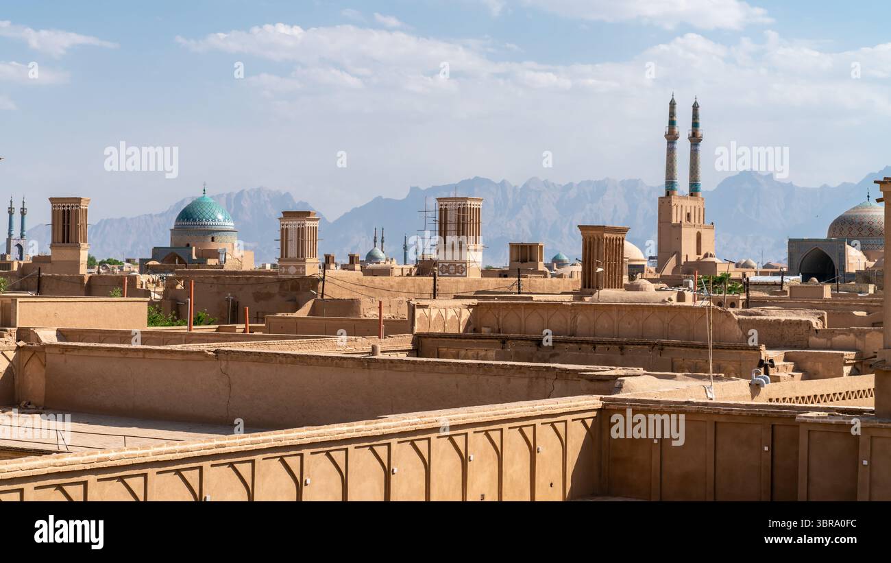 Yazd, Iran - 12 May 2019: Yazd cityscape featuring traditional mudbrick ...