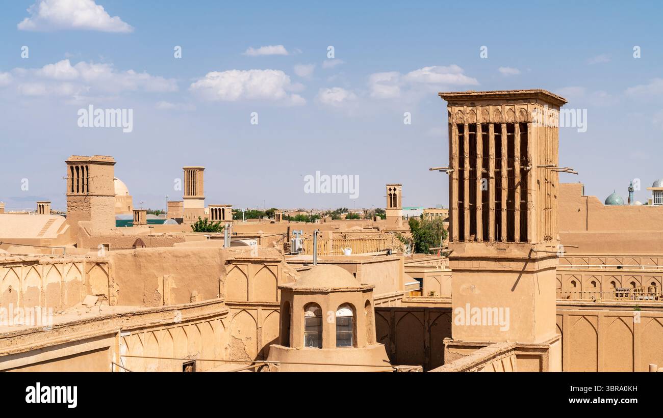 Yazd, Iran - 12 May 2019: Yazd cityscape featuring traditional mudbrick ...