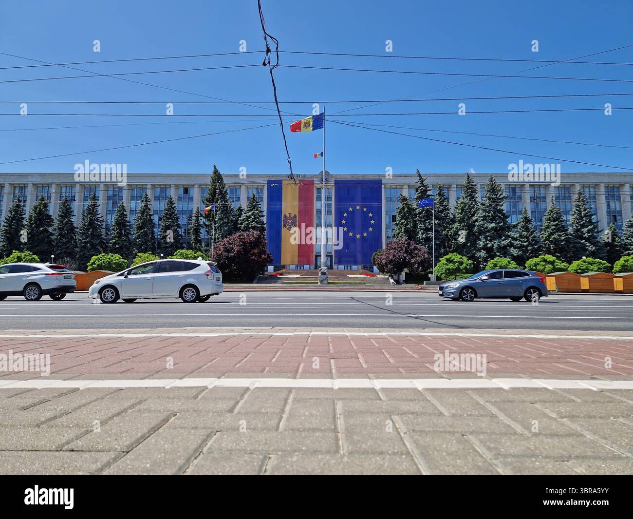 CHISINAU, MOLDOVA - JUNE 20, 2025 The Government House adorned with big ...