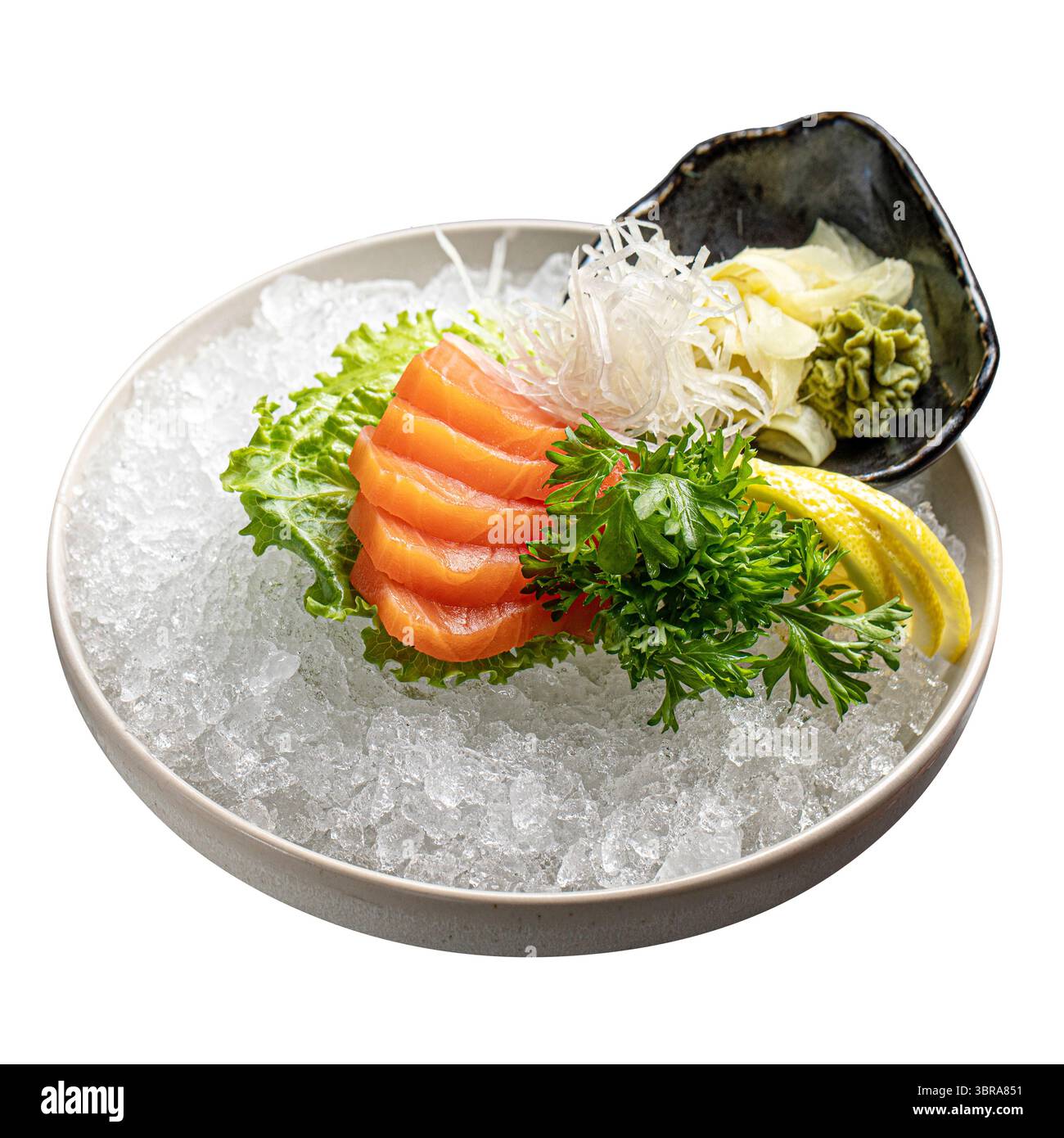 Salmon sashimi on ice with lemon and wasabi Stock Photo - Alamy