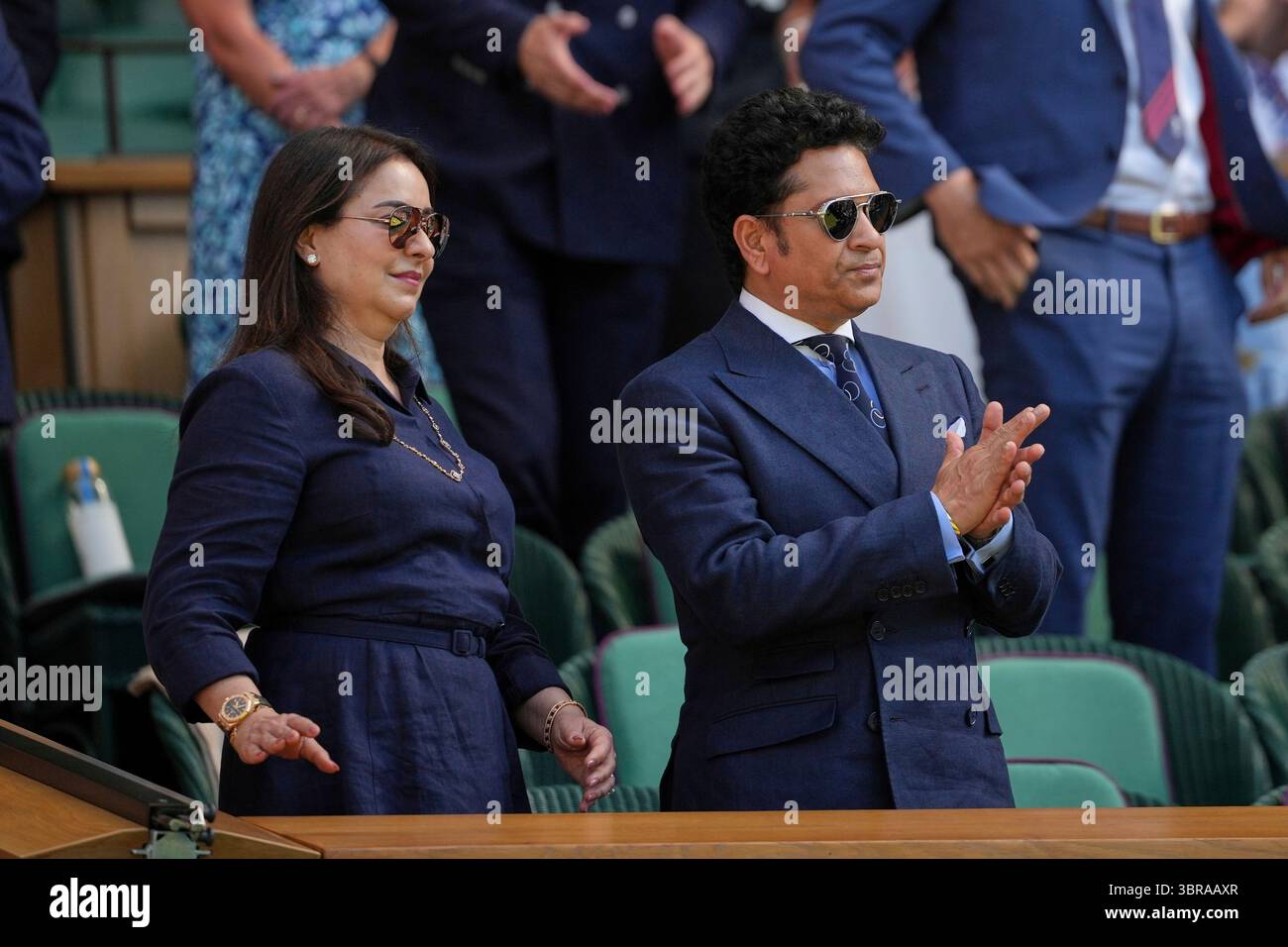 Indian cricket legend, Sachin Tendulkar with his wife Anjali applaud as ...