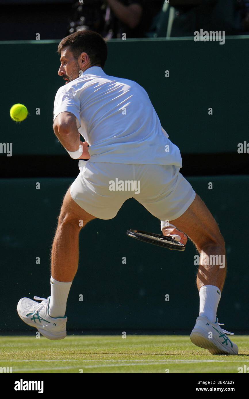 Serbia's Novak Djokovic returns to Italy's Jannik Sinner in a men's ...