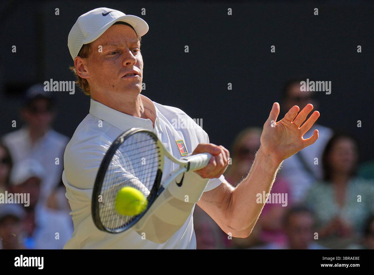 Italy's Jannik Sinner returns to Serbia's Novak Djokovic in a men's ...