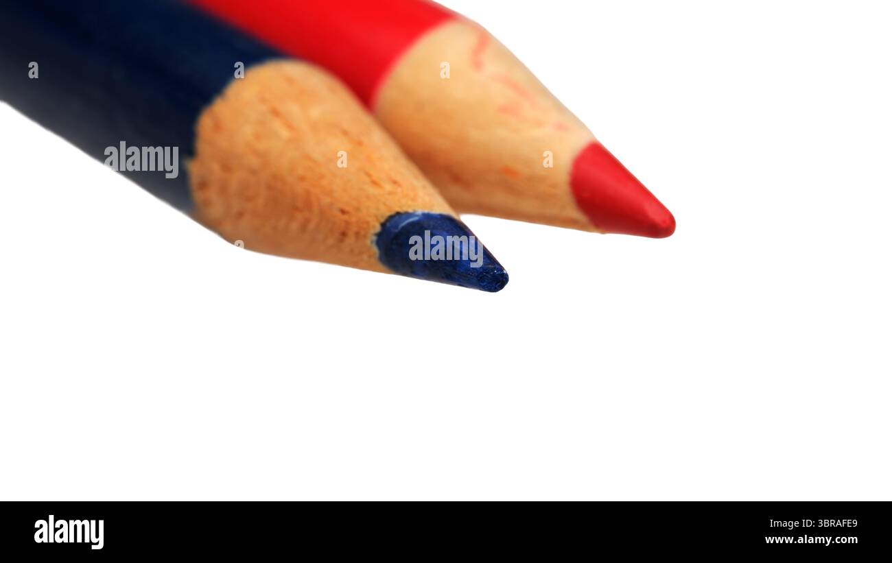 Two pencil tips in red and blue showcase their vibrant hues against ...