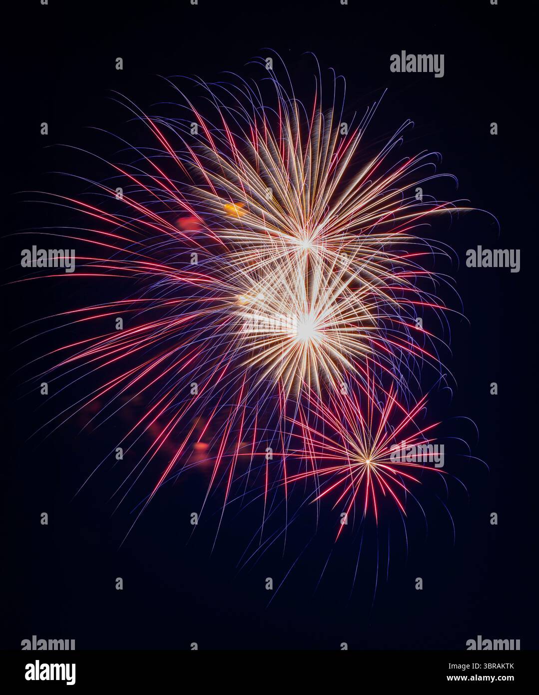 Colourful fireworks exploding in the night sky Stock Photo - Alamy