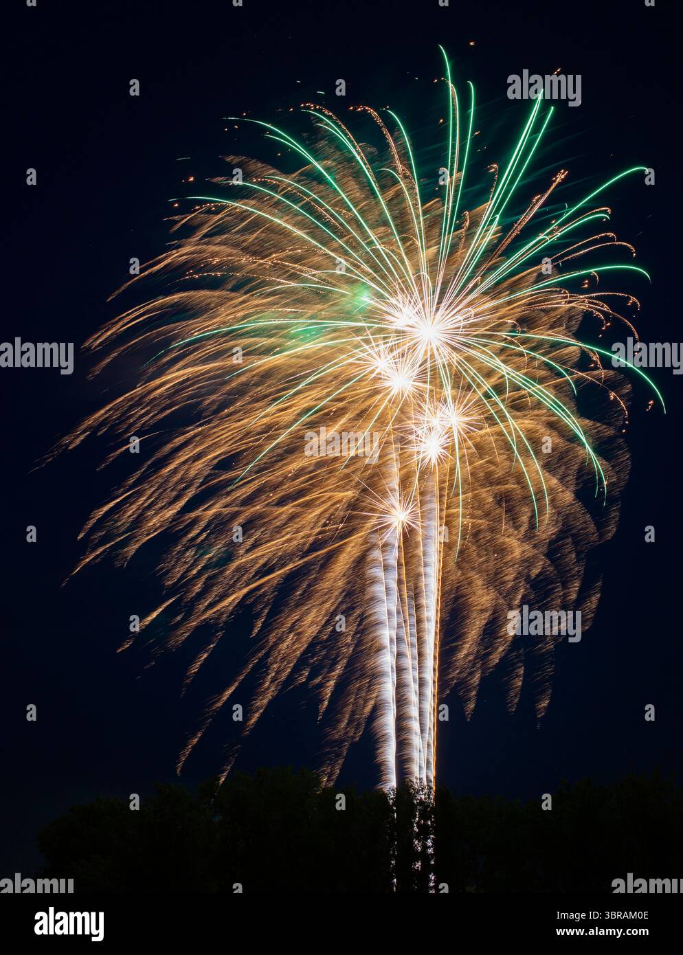 Colourful fireworks exploding in the night sky Stock Photo - Alamy