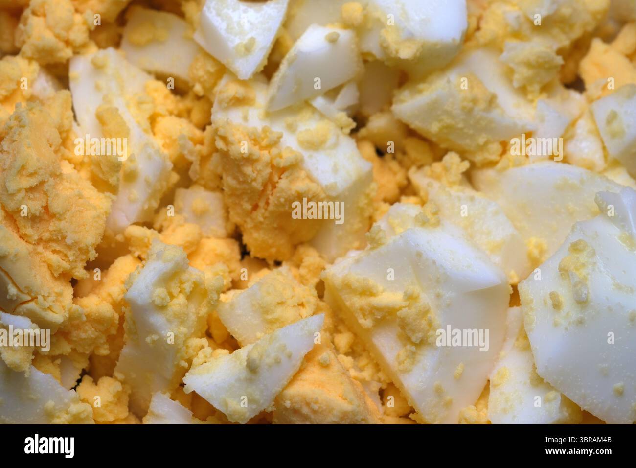 Boiled egg chunks blend with buttery flavors, creating a beloved dish ...