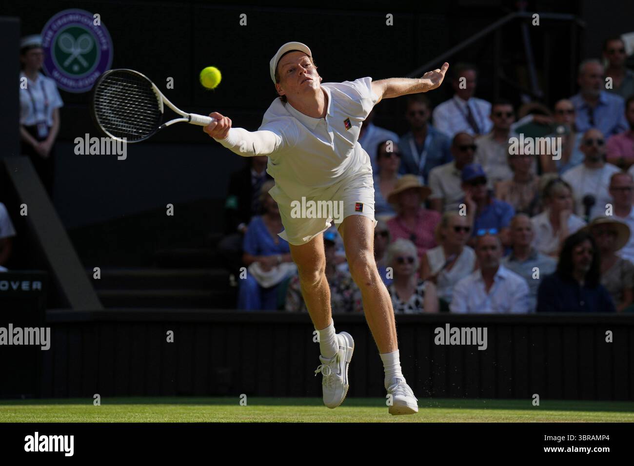 Italy's Jannik Sinner returns to Serbia's Novak Djokovic in a men's ...