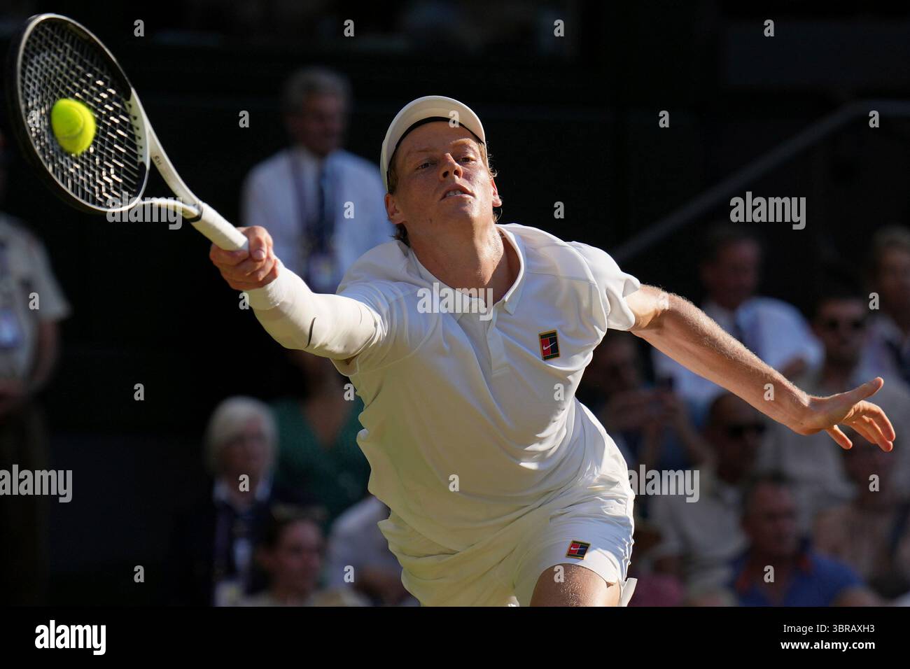 Italy's Jannik Sinner returns to Serbia's Novak Djokovic in a men's ...