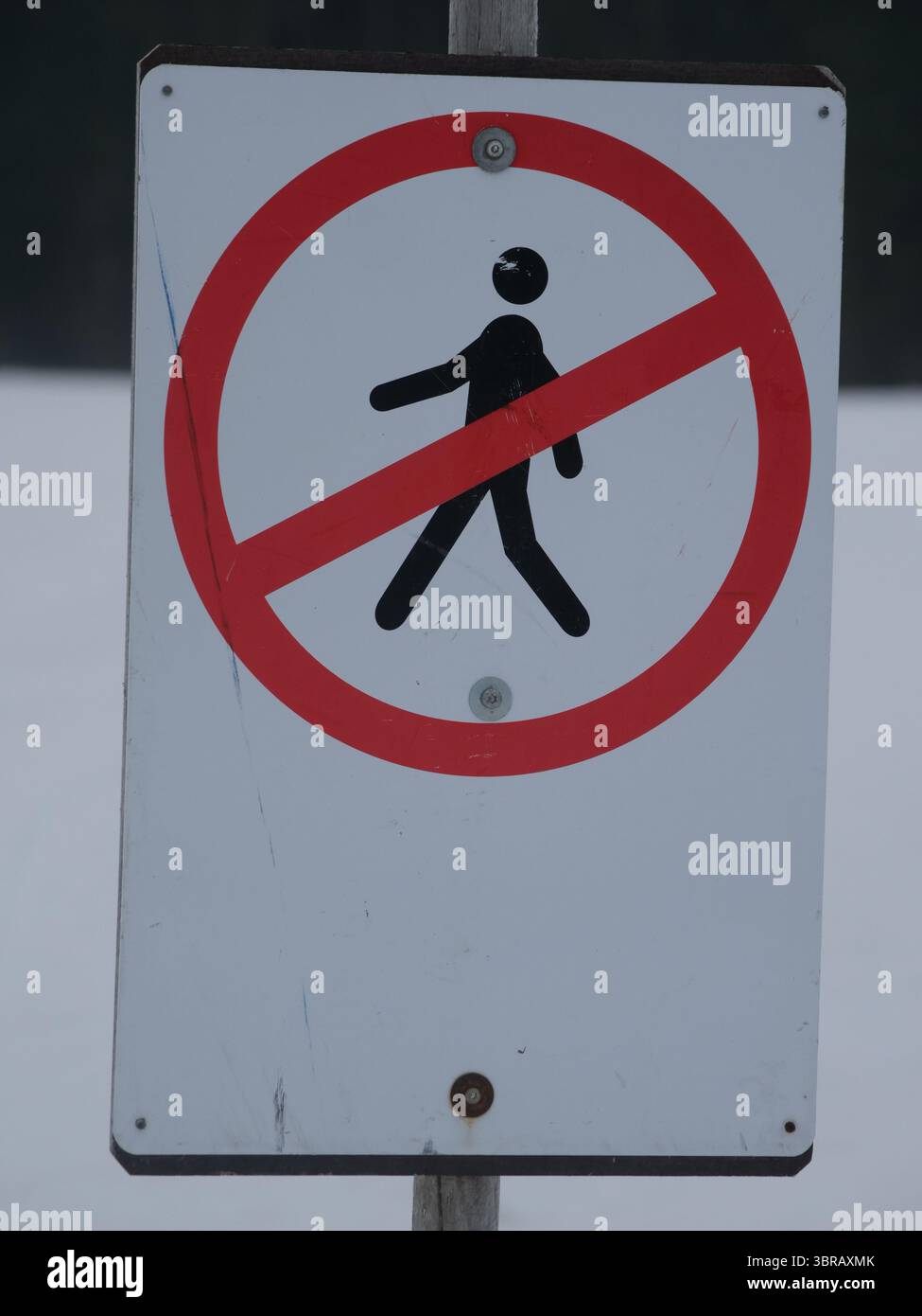 Sign with a red circle and a black man walking on it Stock Photo - Alamy