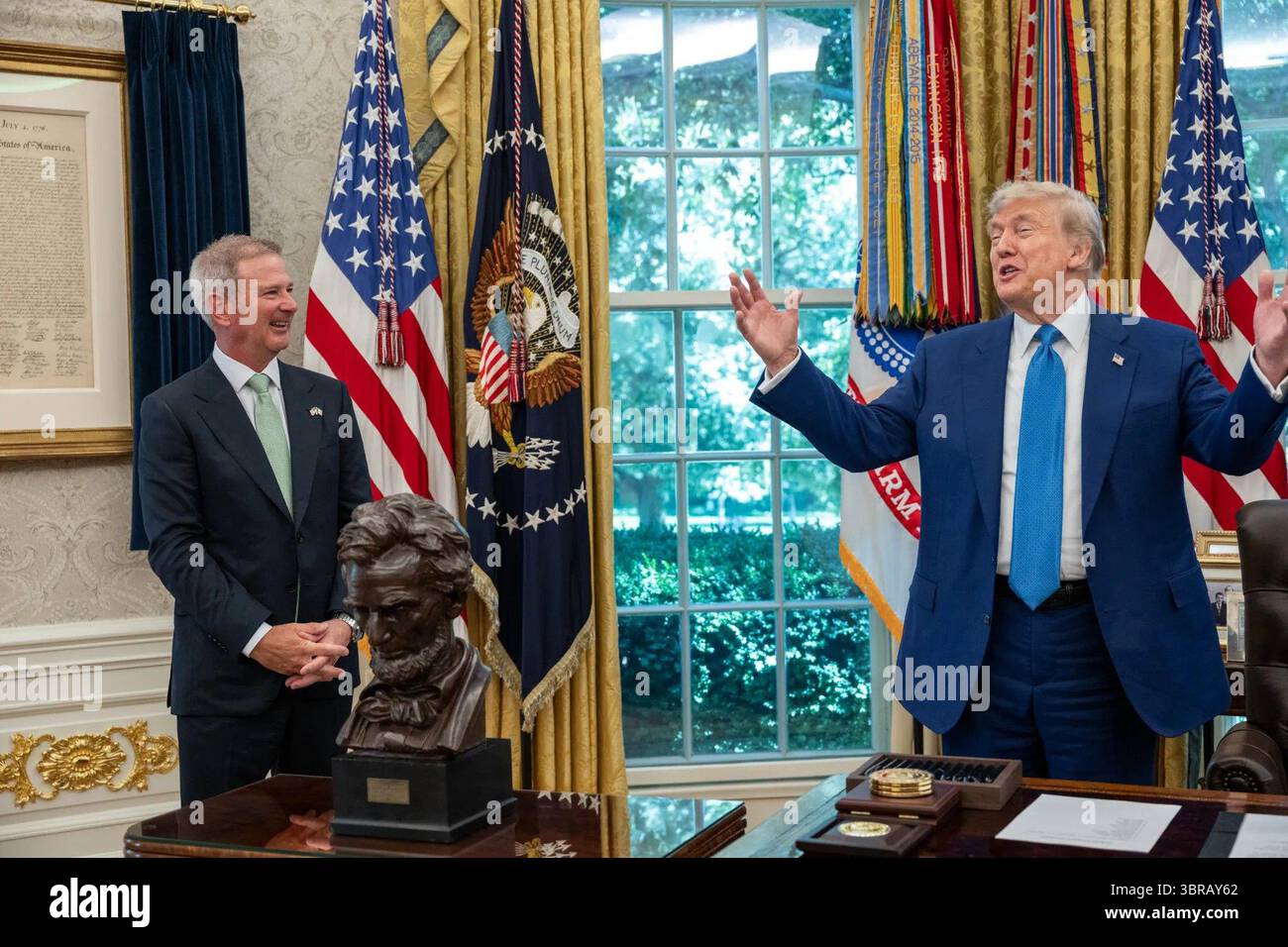 President Donald Trump gestures during a meeting with U.S. Ambassador to Ireland Edward Walsh in ...