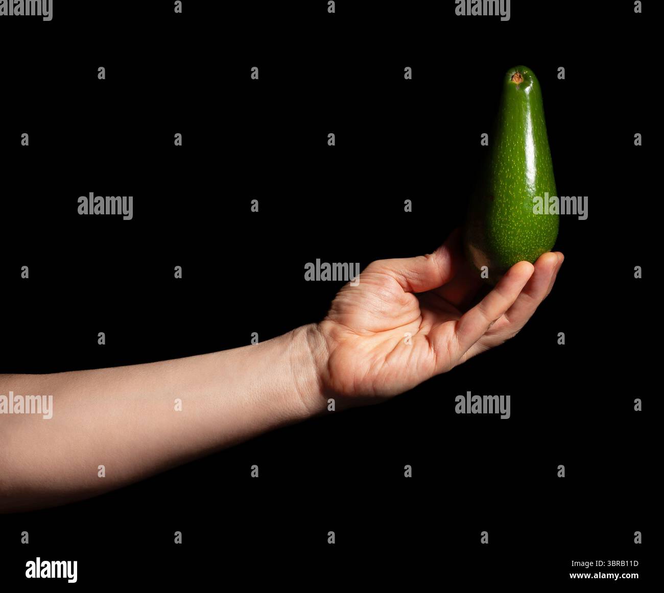 Holding an avocado hi-res stock photography and images - Alamy