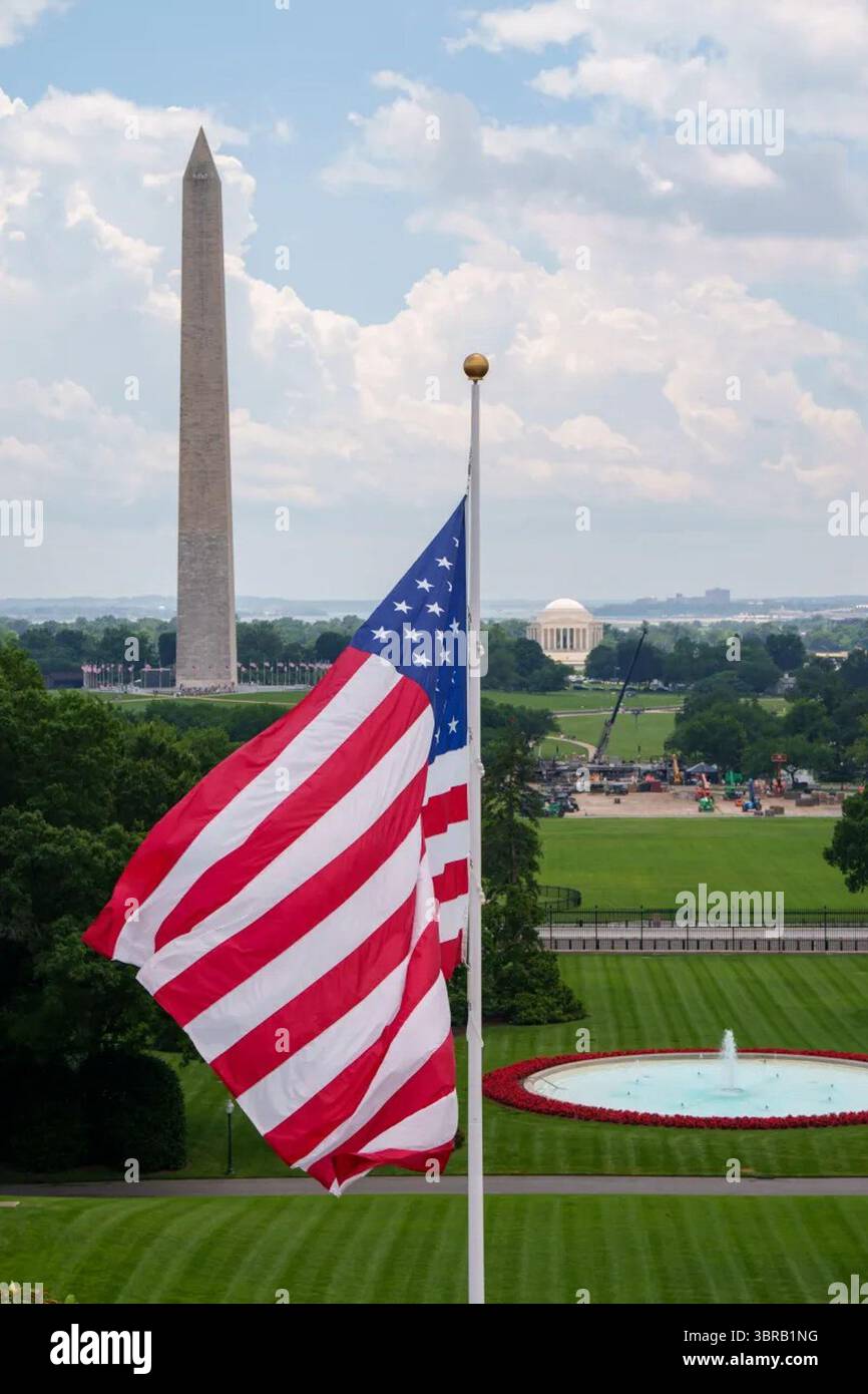 New American flag raised by President Donald Trump waves on the South Lawn of the White House ...