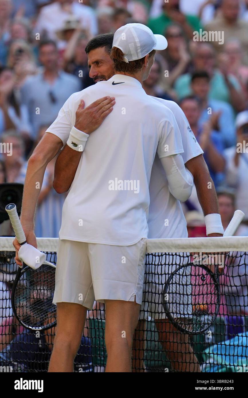 Italy's Jannik Sinner, left, greets Serbia's Novak Djokovic after ...