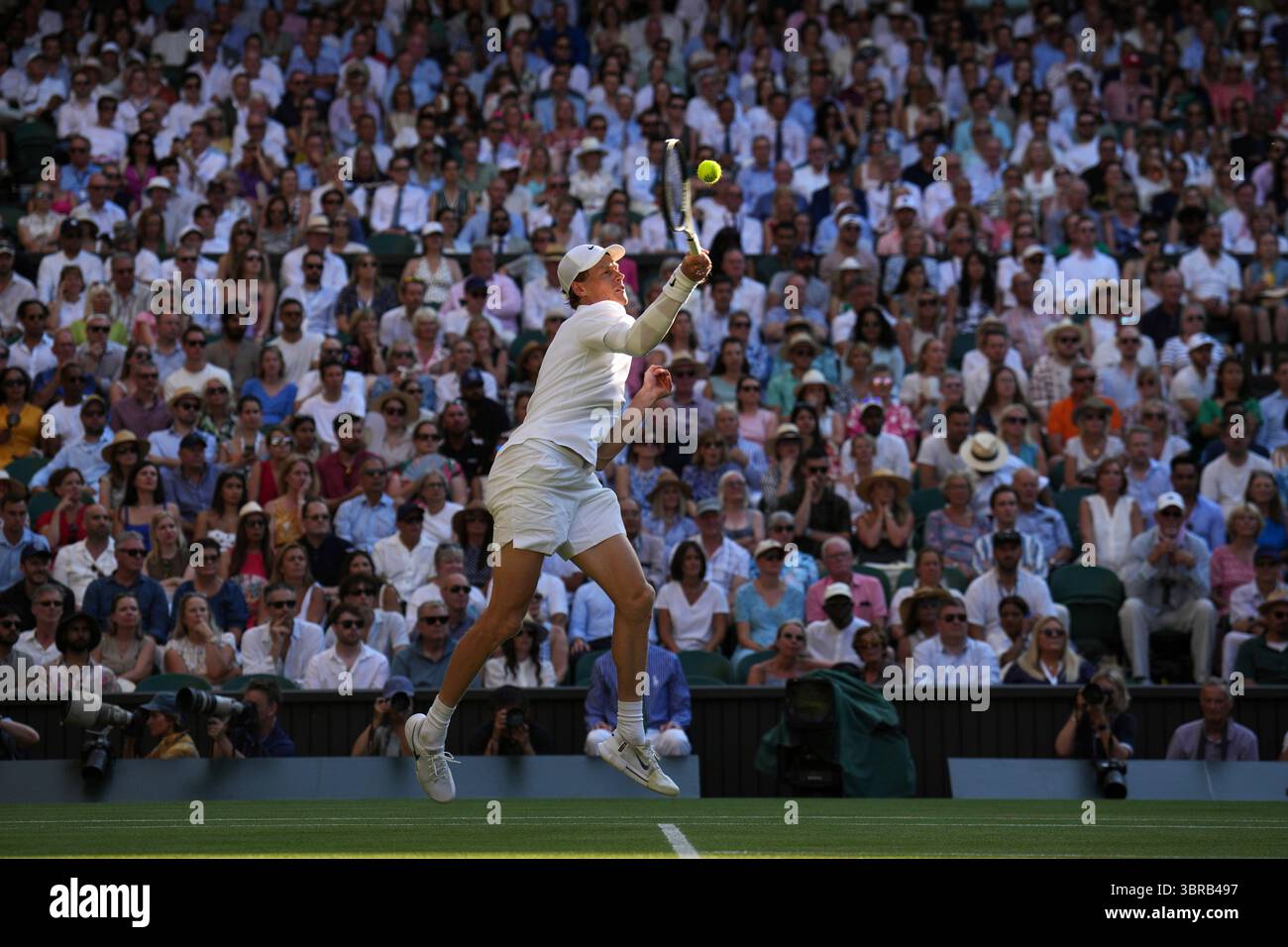 Italy's Jannik Sinner returns to Serbia's Novak Djokovic in a men's ...