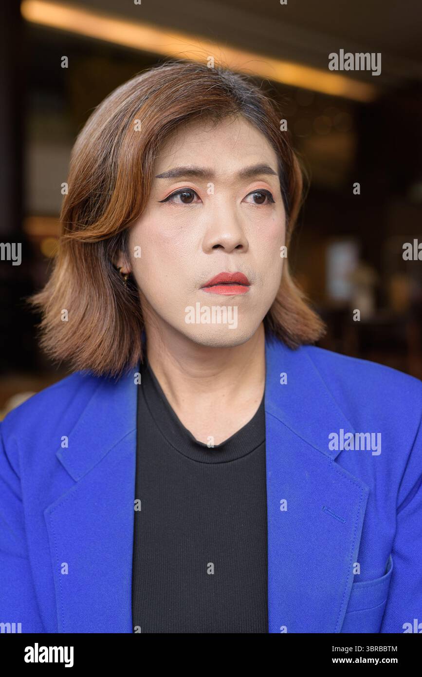 Trans woman in suit hi-res stock photography and images - Alamy