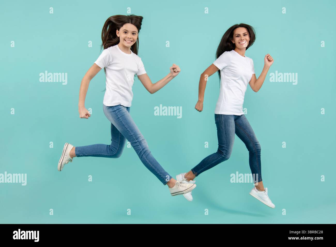 Run of mother and daughter. Energy and motion. Mother and daughter run ...