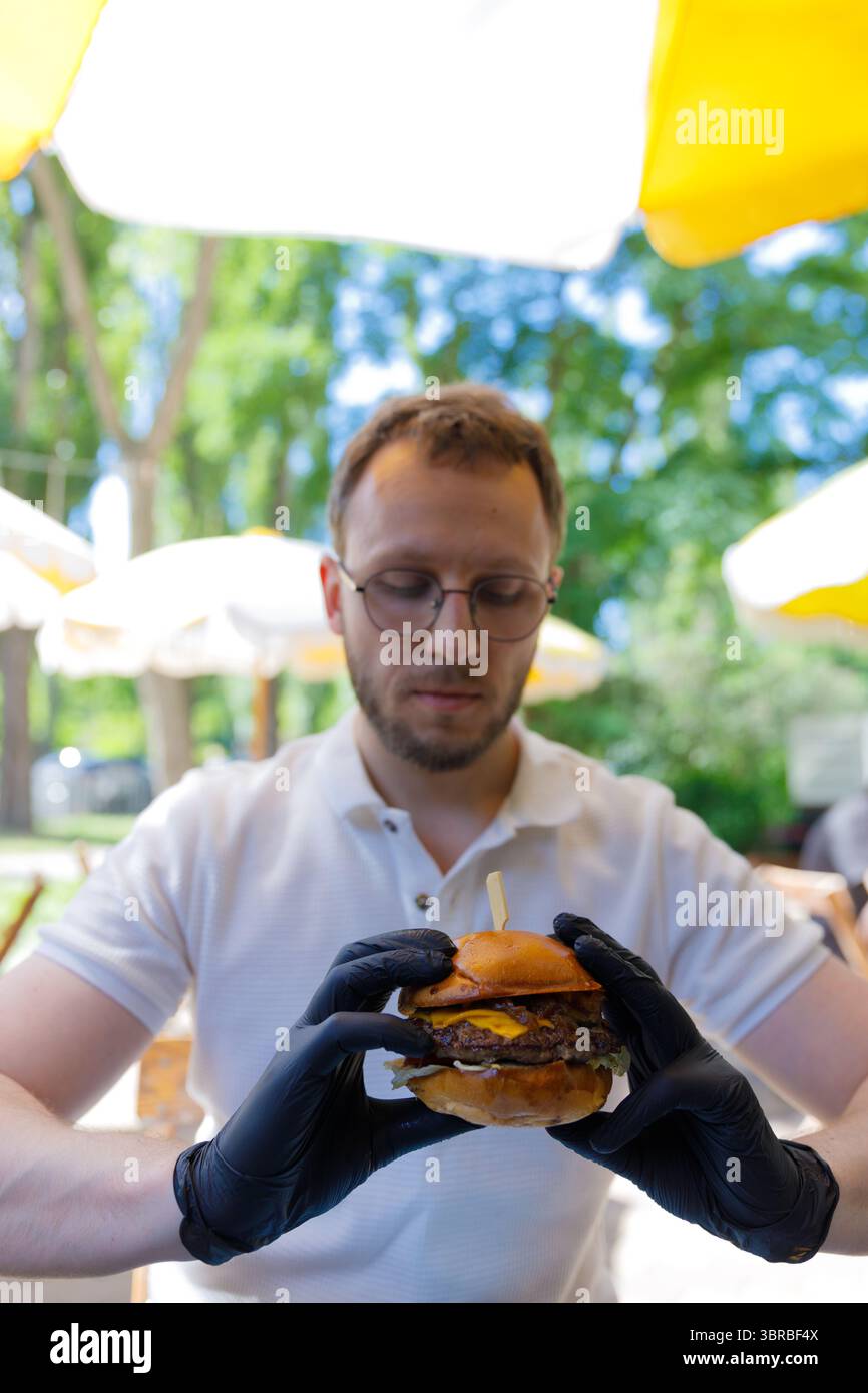 A Food Enthusiast Ready to Indulge in a Delicious Burger Surrounded by ...