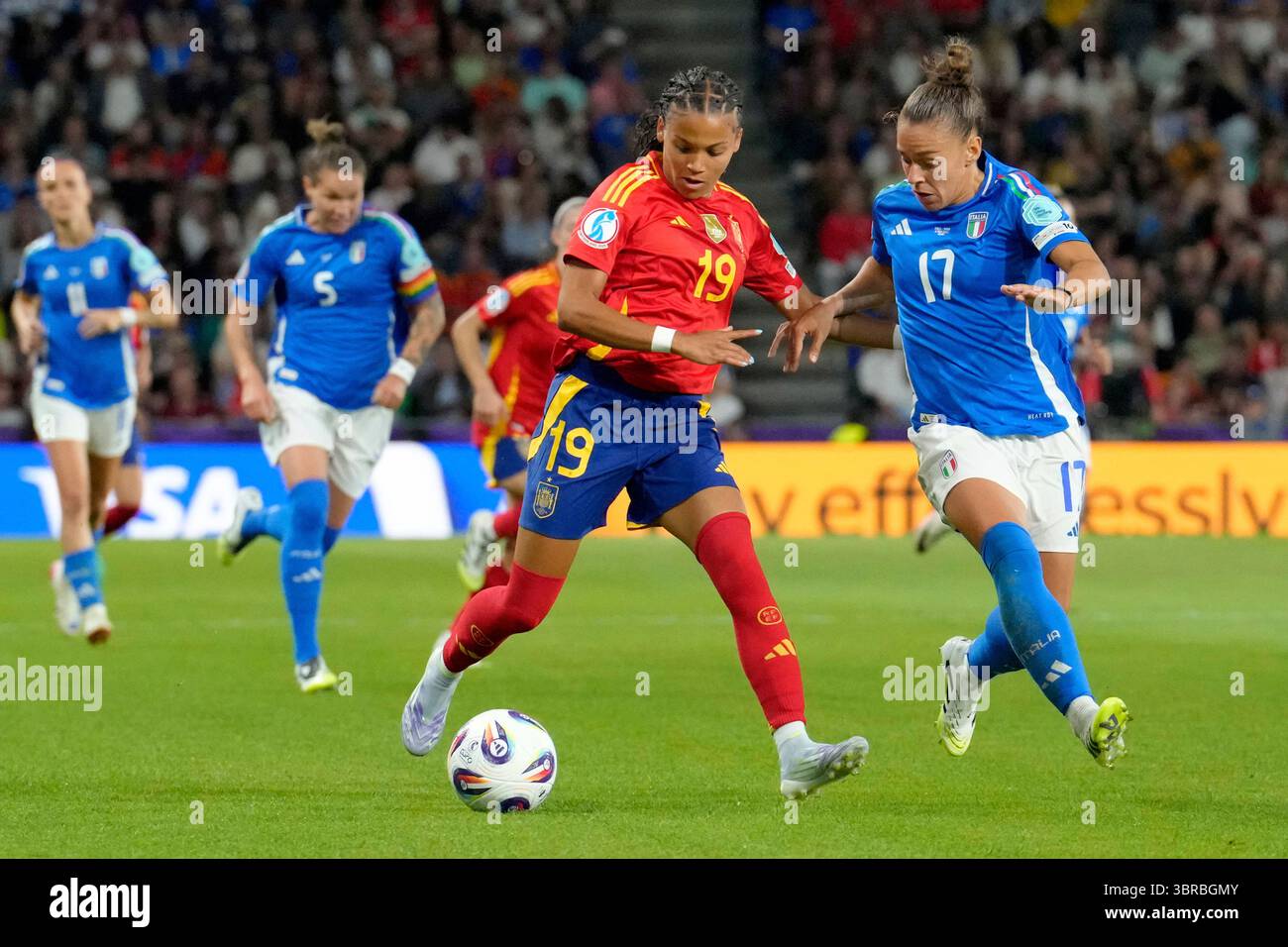 Spain's Vicky Lopez vies for the ball with Italy's Lisa Boattin, right ...