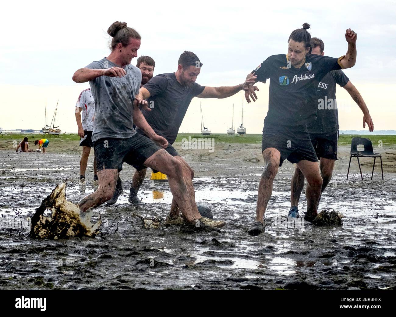 Mud Football - Football on the mud at the Old Leigh Regatta, Leigh on ...