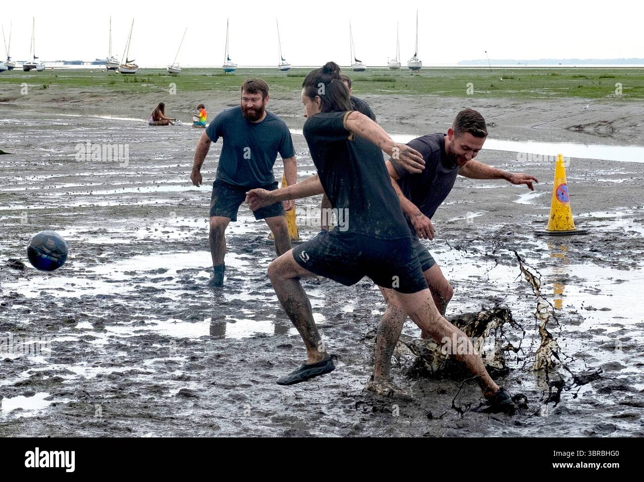 Mud Football - Football on the mud at the Old Leigh Regatta, Leigh on ...