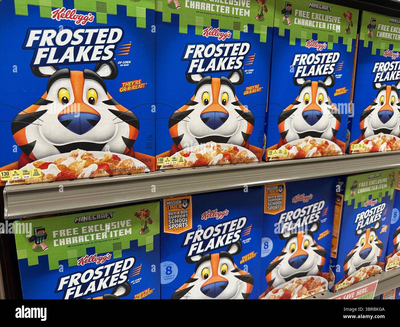 Kellogg's Frosted Flakes cereal boxes are on display at a supermarket ...