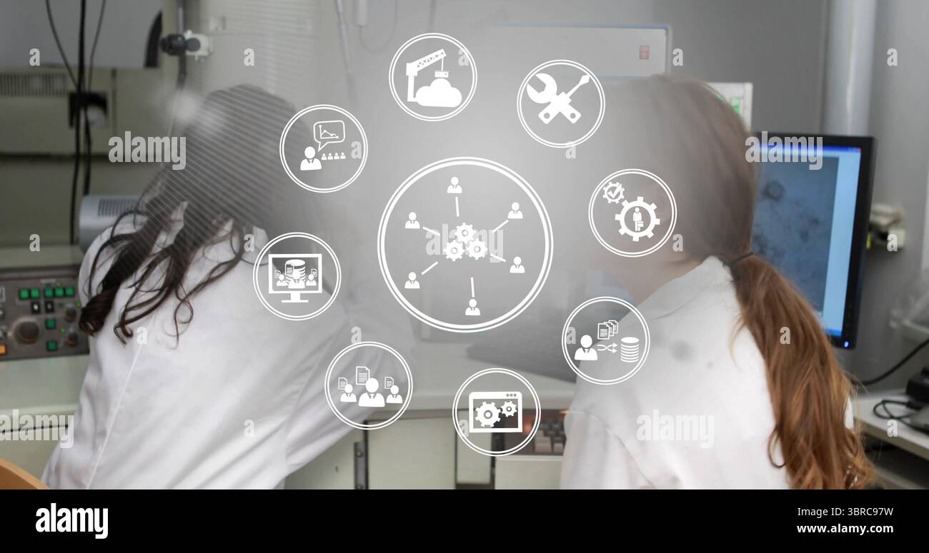 Observing female researchers examining microscopy data on screens in ...