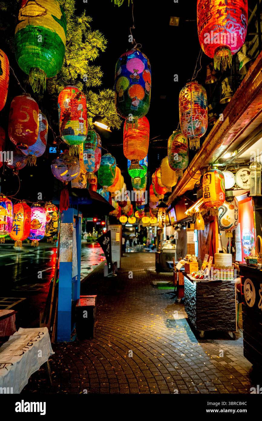 Tainan, Taiwan – Jun 29, 2025: Colorful hand-painted lanterns hanging ...