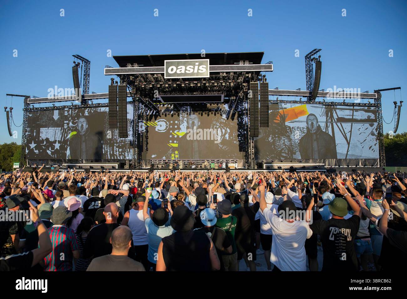Manchester, England, 11th July, 2025. Oasis playing the first of five ...