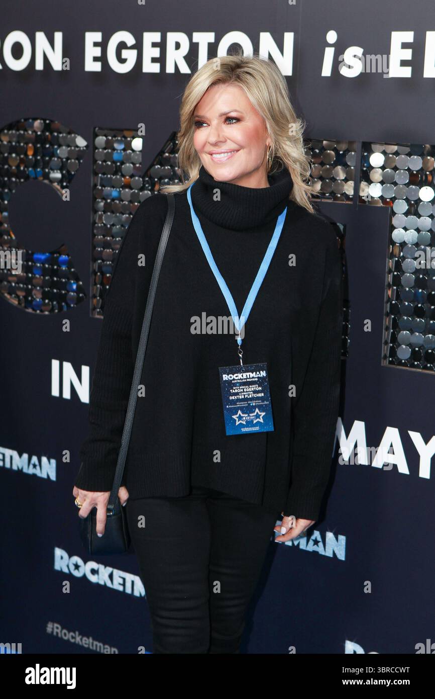 Emily Symons arriving at the Rocketman premiere with Taron Egerton and ...