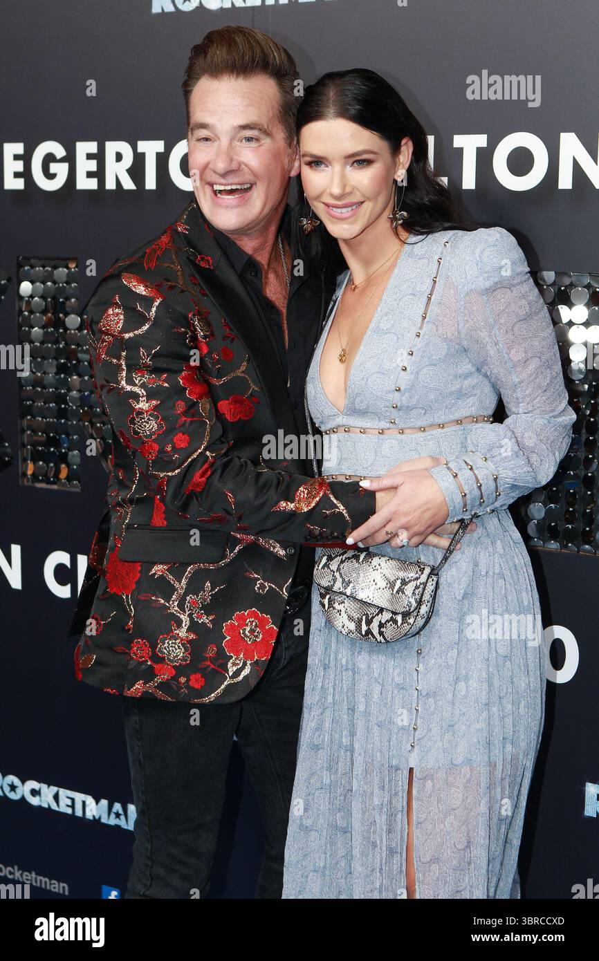 Richard Reid, Brittney Hockley arriving at the Rocketman premiere with ...