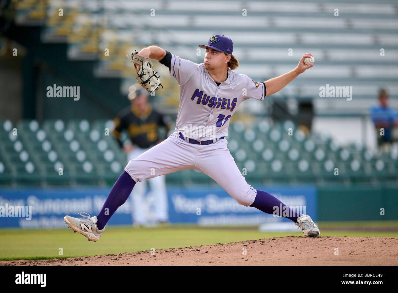 Fort Myers Mighty Mussels pitcher Zander Sechrist (18) delivers a pitch ...