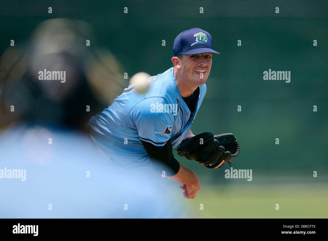 FCL Rays pitcher Trey Pooser (57) delivers the first pitch of his ...