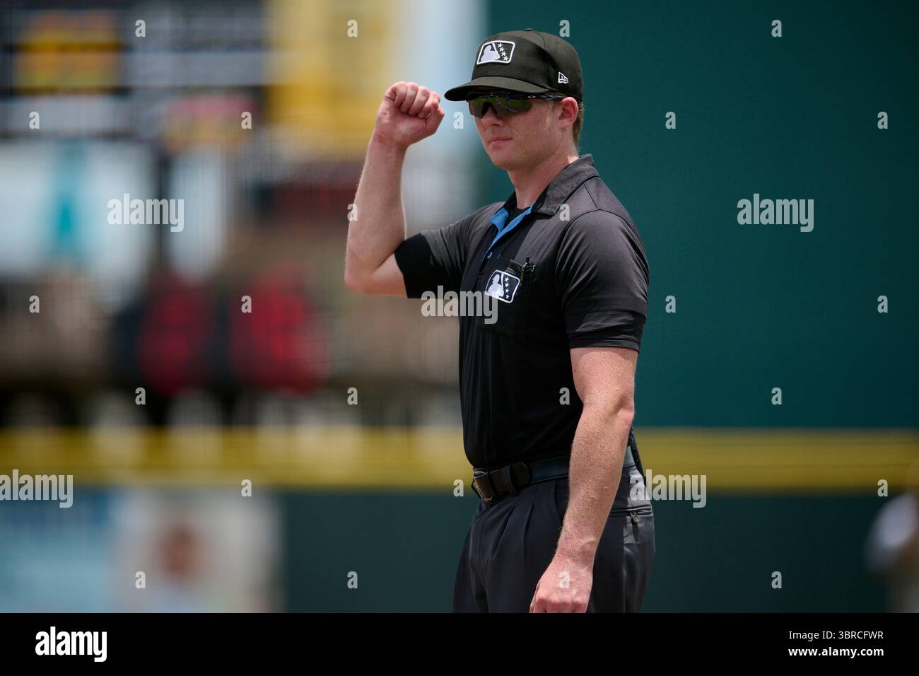Umpire Nicholas Saxton calls an out during an MiLB Florida State League ...