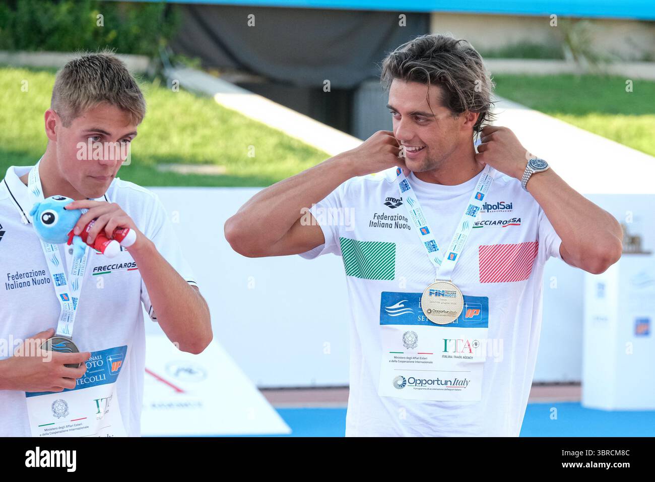 Thomas Ceccon of Italy (R) and Christian Bacico of Italy (L) are seen ...