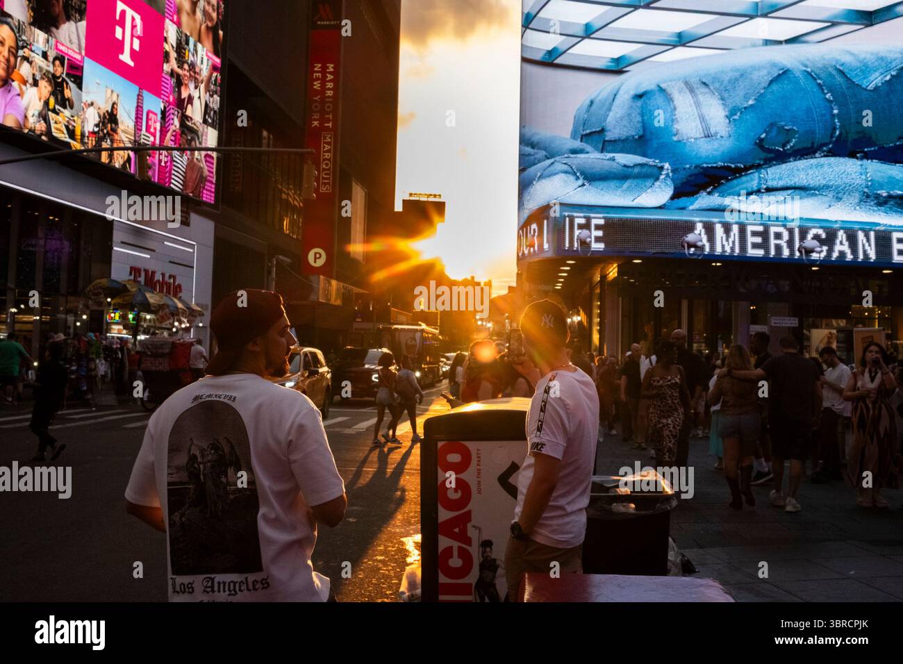 The second Manhattanhenge of the year is seen in Times Square in New ...