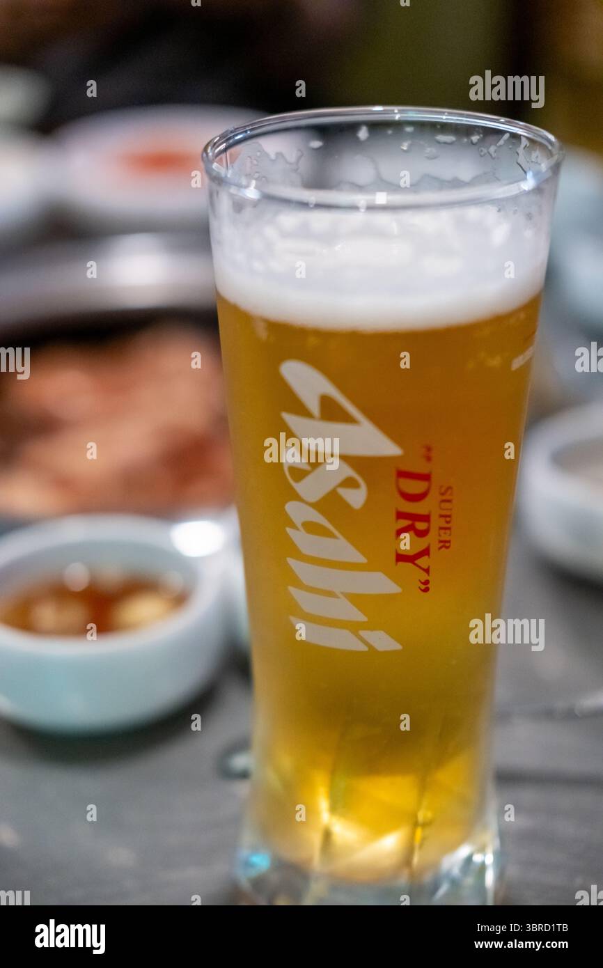 Seoul, South Korea - 16 June 2025: A pint of Asahi with Korean Style ...