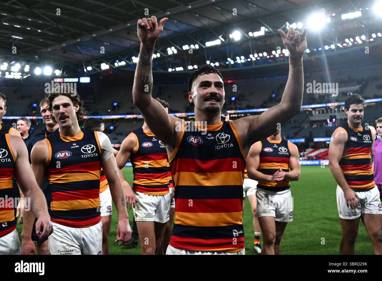 Izak Rankine of the Crows celebrates as he leaves the field following ...