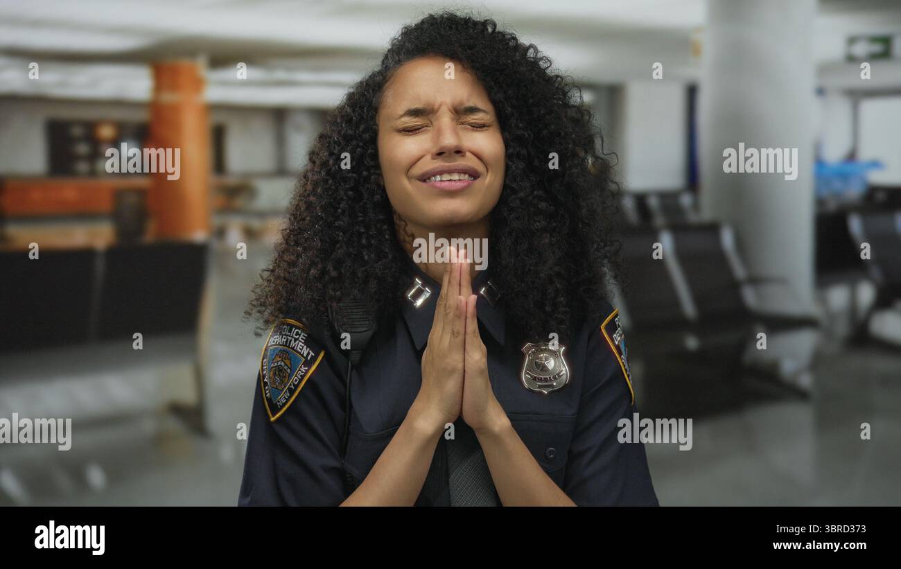 Woman praying airport terminal in hi-res stock photography and images ...