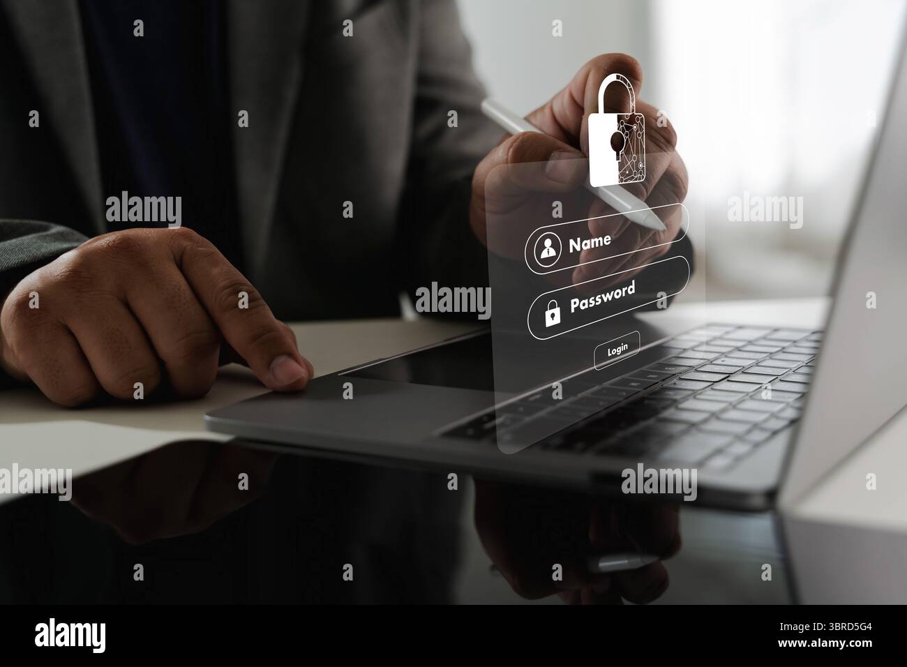 A cybersecurity data privacy image shows person using laptop with ...