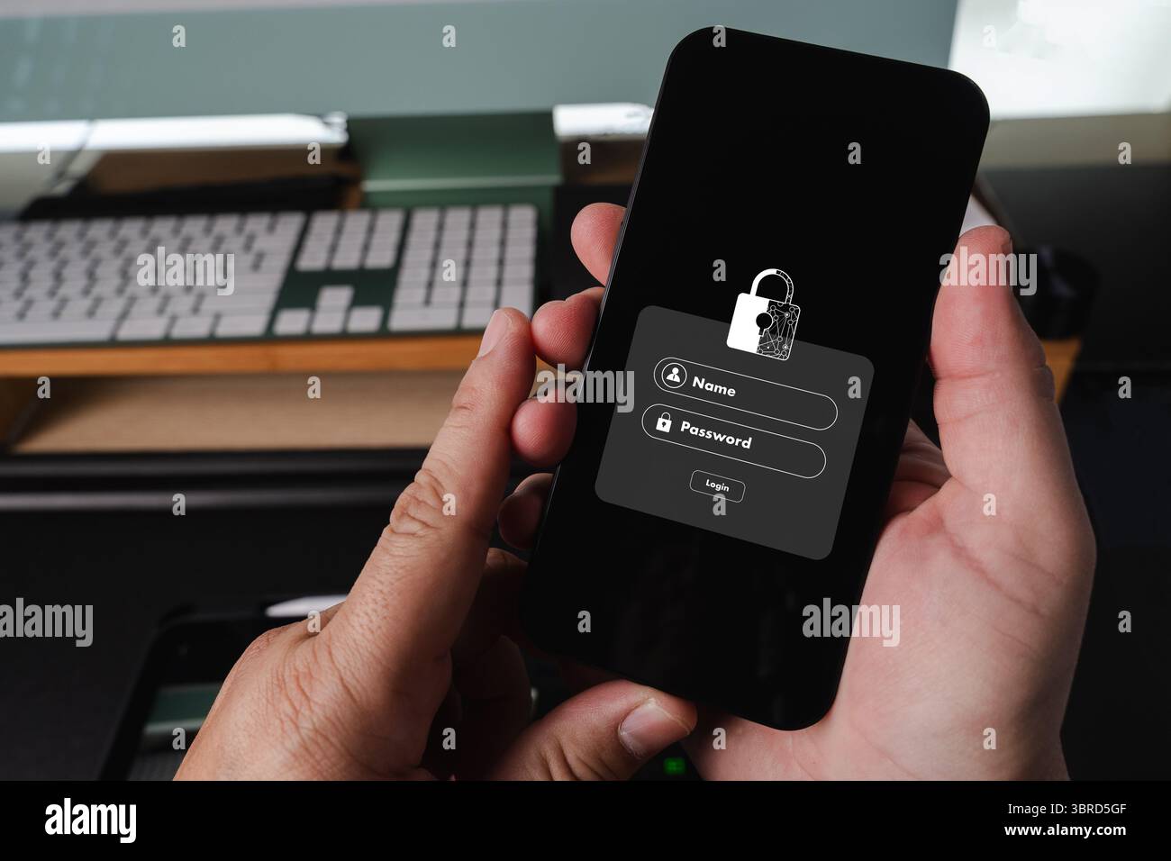 A cybersecurity data privacy person holding smartphone with login ...