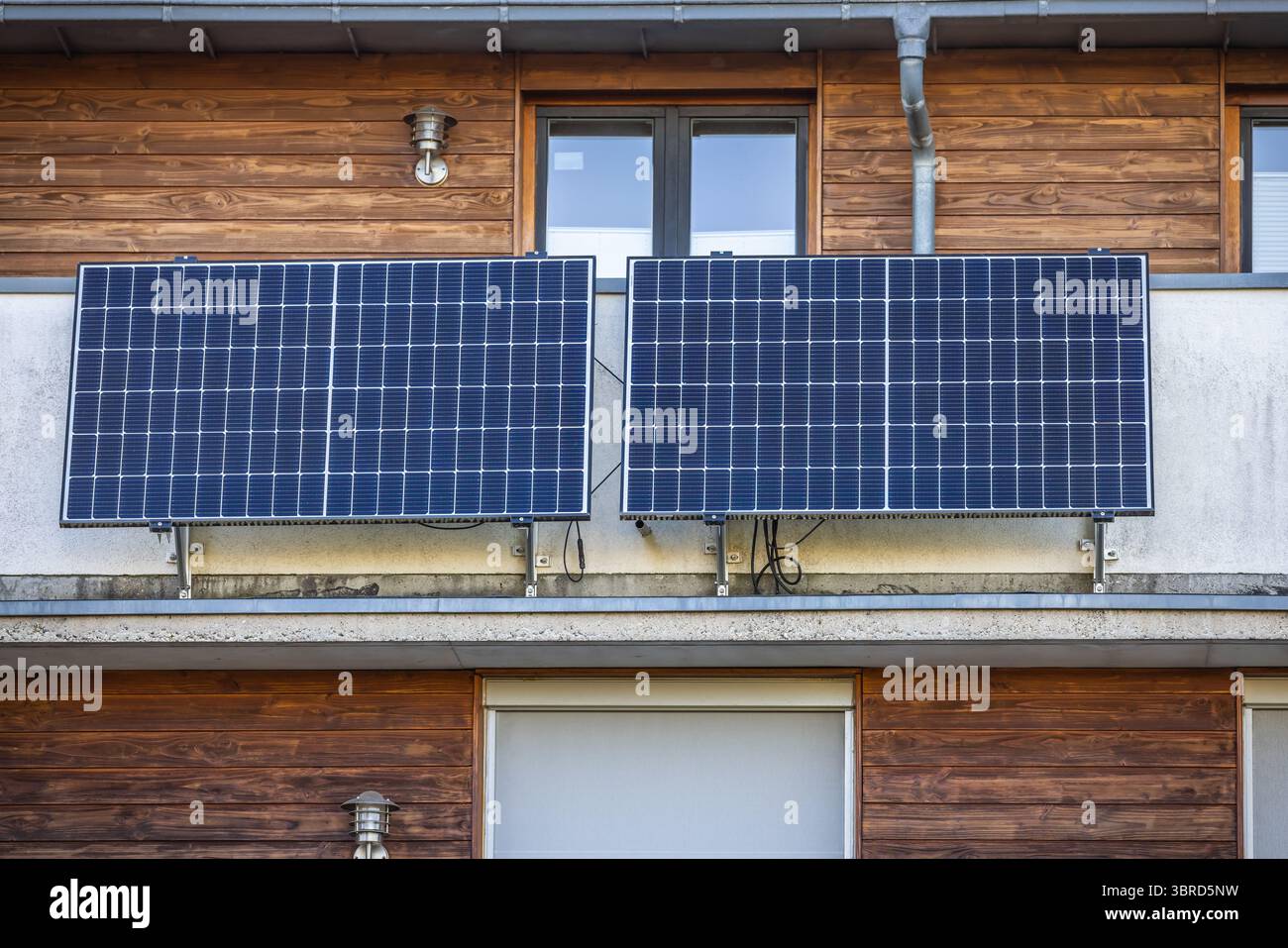 Balcony solar power plant. Solar battery on balcony wall. Mini PV ...