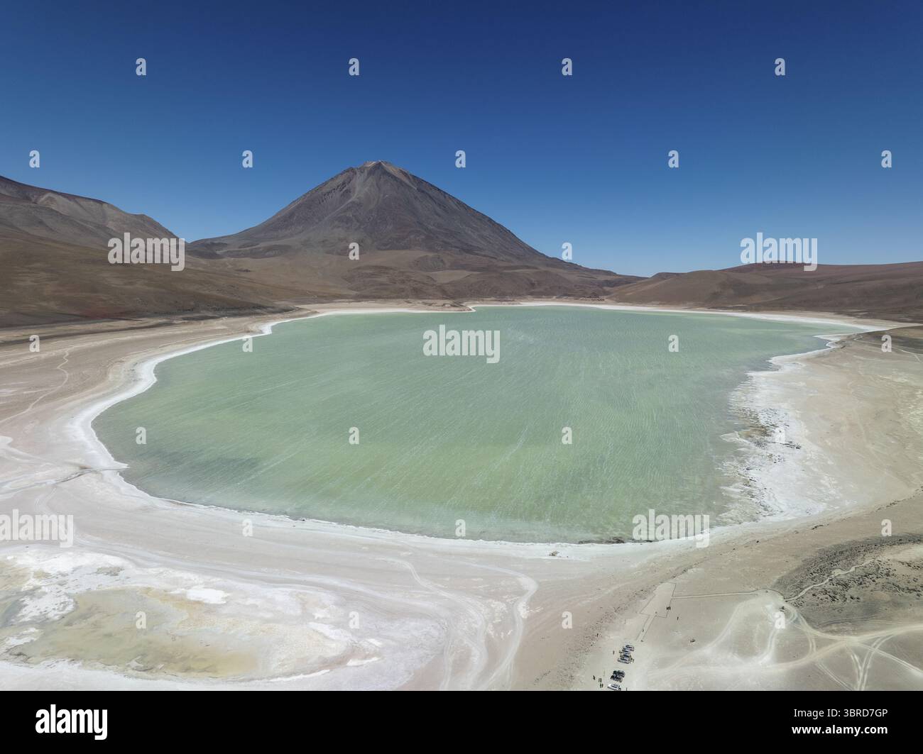 Aerial view of the serene Laguna Verde mirroring the sky under the ...