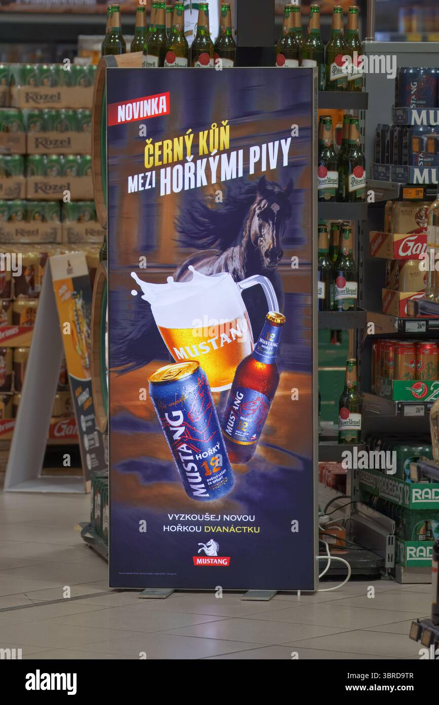 Editorial image of a promotional stand for Mustang beer with the slogan ...
