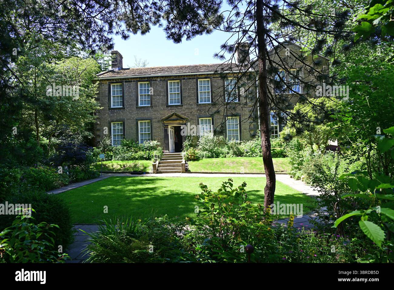 Haworth Parsonage museum in Summer sunshine, Bronte country, West ...