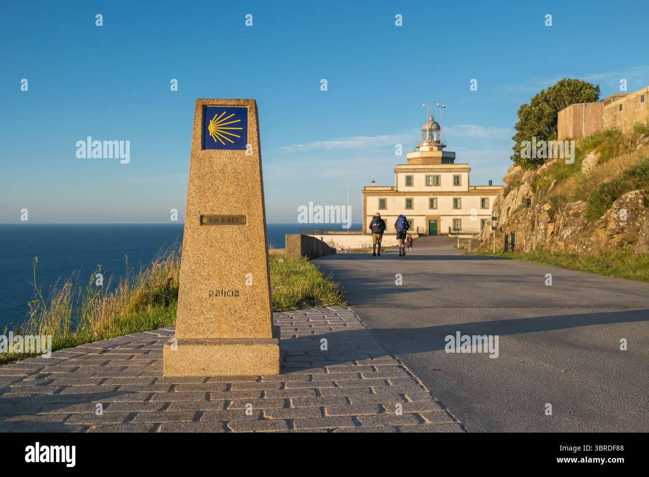 Zero Kilometer Sign and Lighthouse at End of Camino in Finisterre ...