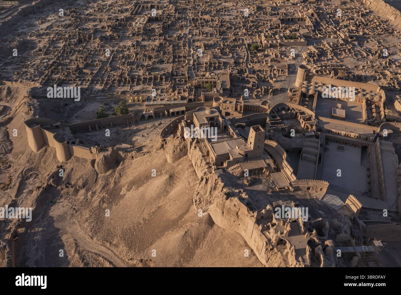 Aerial view of the sun-baked Arg-e Bam citadel, a majestic ruin against ...