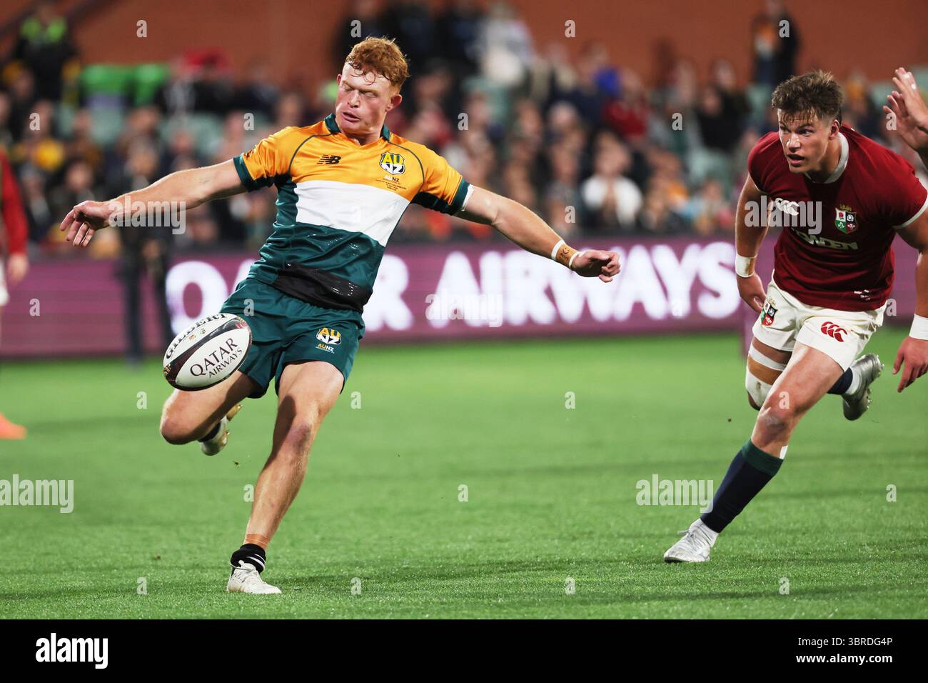 Tane Edmed of the AUNZ Invitational XV kicks the ball during the rugby ...