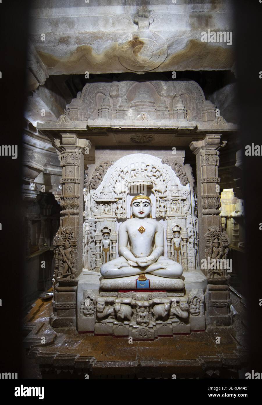 White marble statue of Mahavira in the Jain temple Chandraprabhu in the ...
